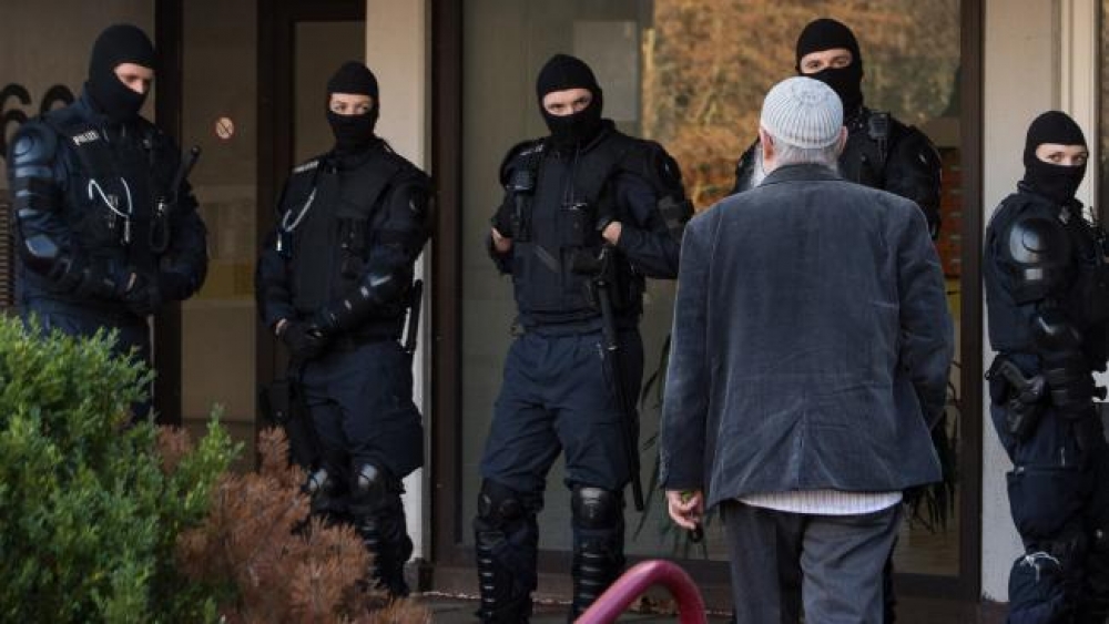 Police raid mosques, flats across Germany as government bans Islamist group