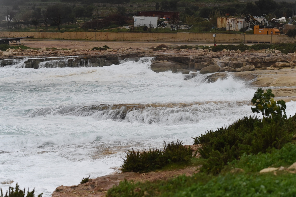 Heavy rain and hail hit streets as weathermen predict coldest December ...