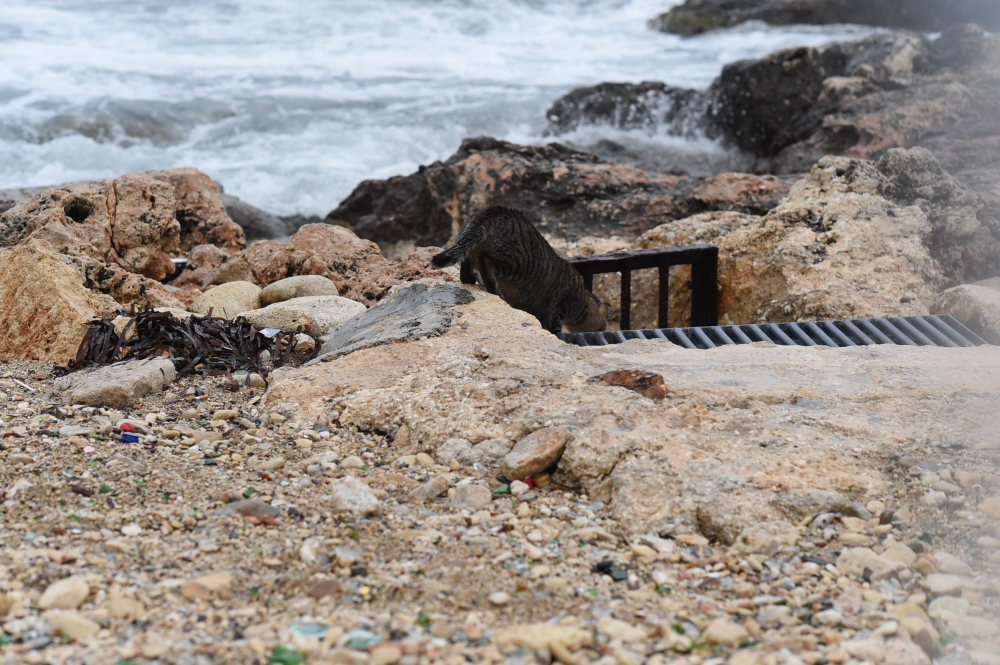 Heavy rain and hail hit streets as weathermen predict coldest December ...