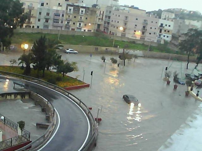 Heavy rain and hail hit streets as weathermen predict coldest December ...