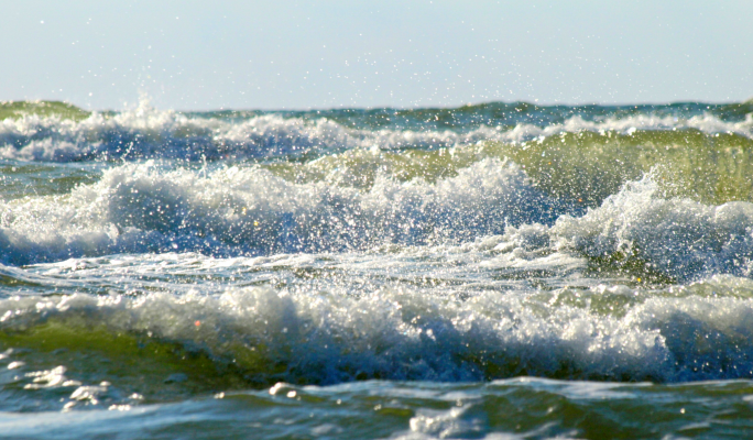 Man dies after falling into strong waves while working on boat